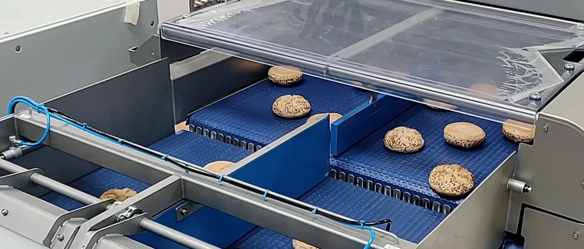 Kaiser roll packaging line - Niverplast NA Inc.